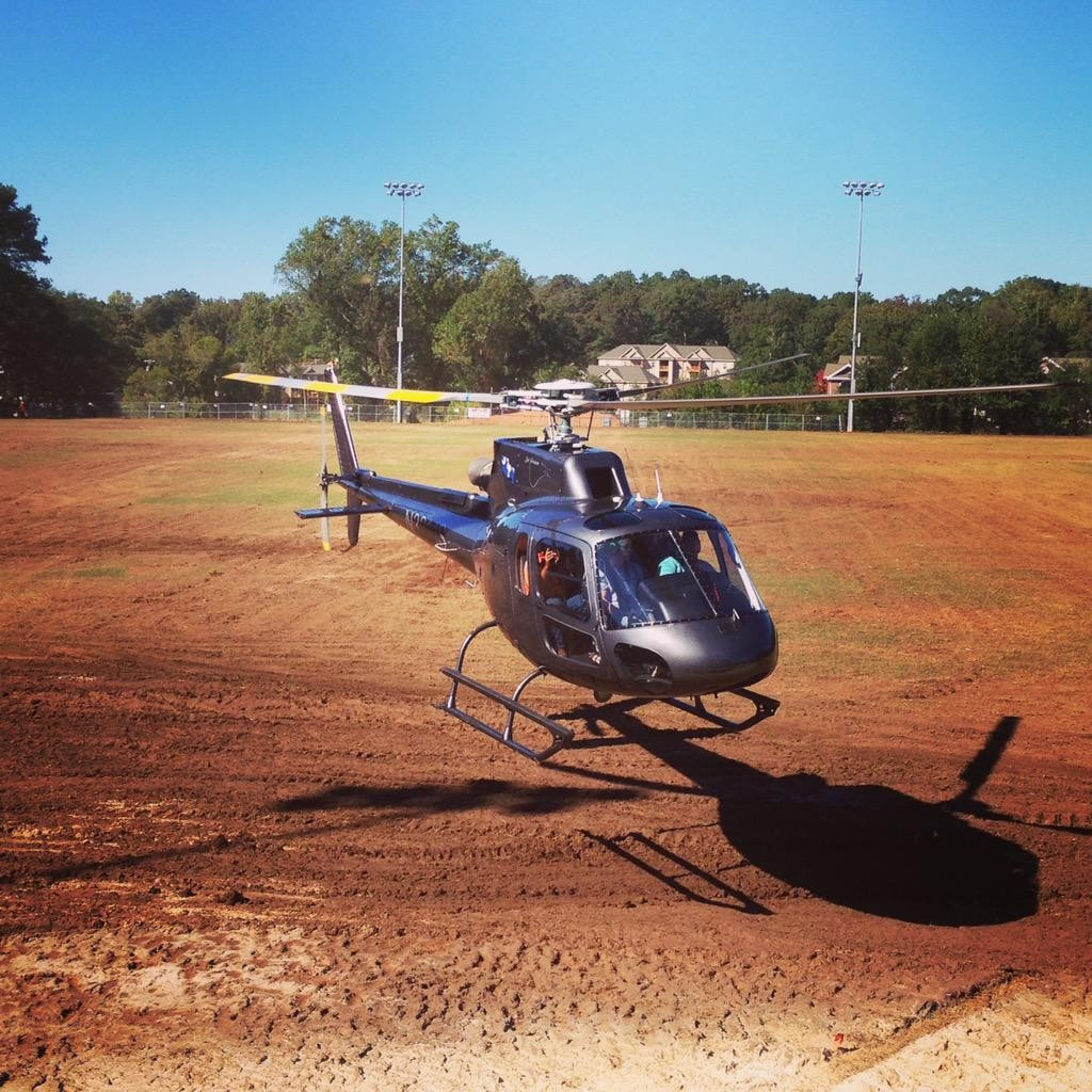 Helicopter Helps Drying of Grass Lots - Clemson University Athletics